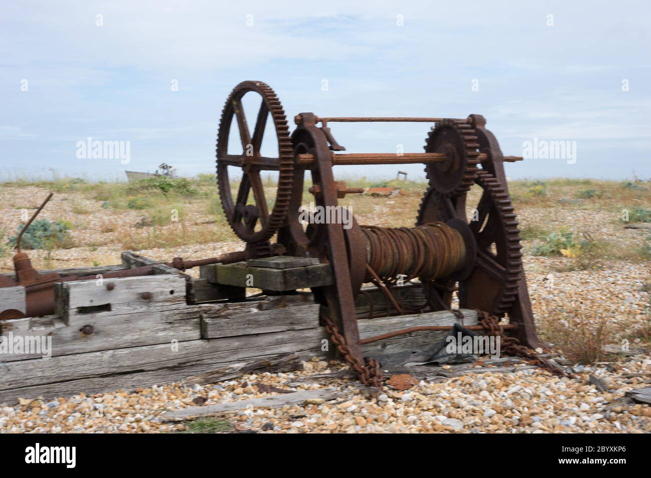 Old rusted windlass or winch on the coast Stock Photo - Alamy