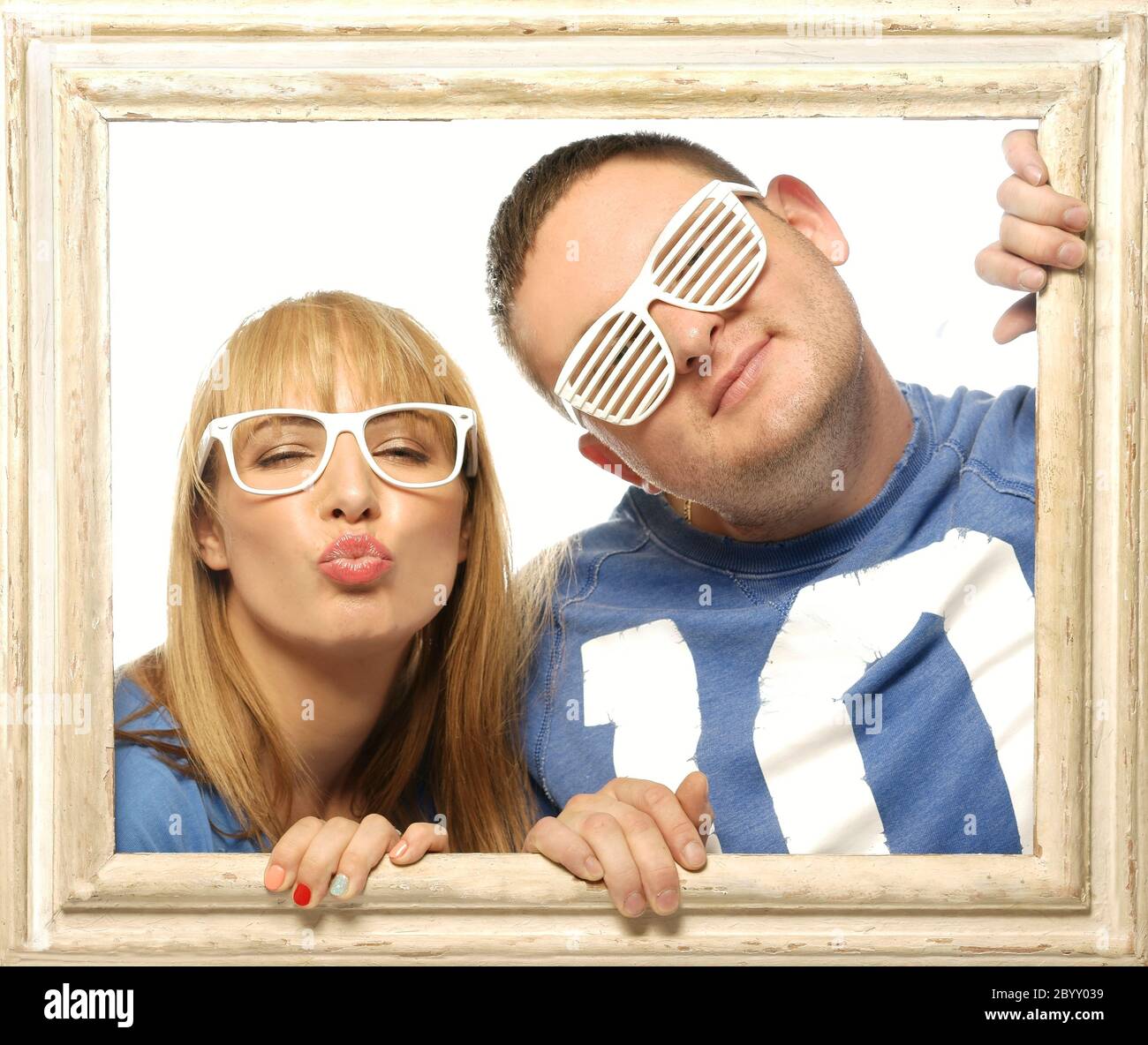 Loving couple in picture frame Stock Photo - Alamy