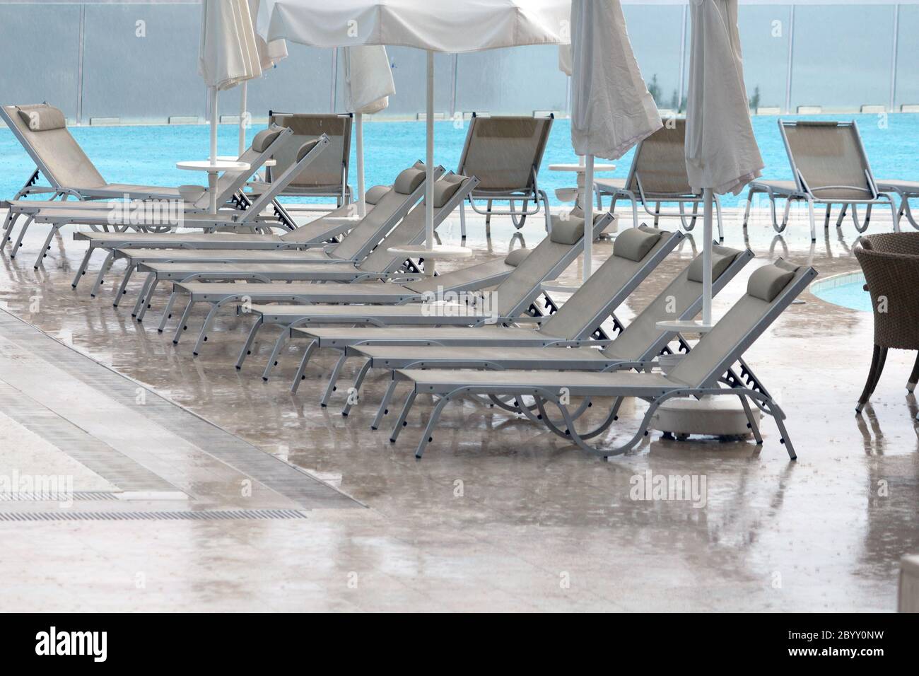 Swimming pool in rain hi-res stock photography and images - Alamy