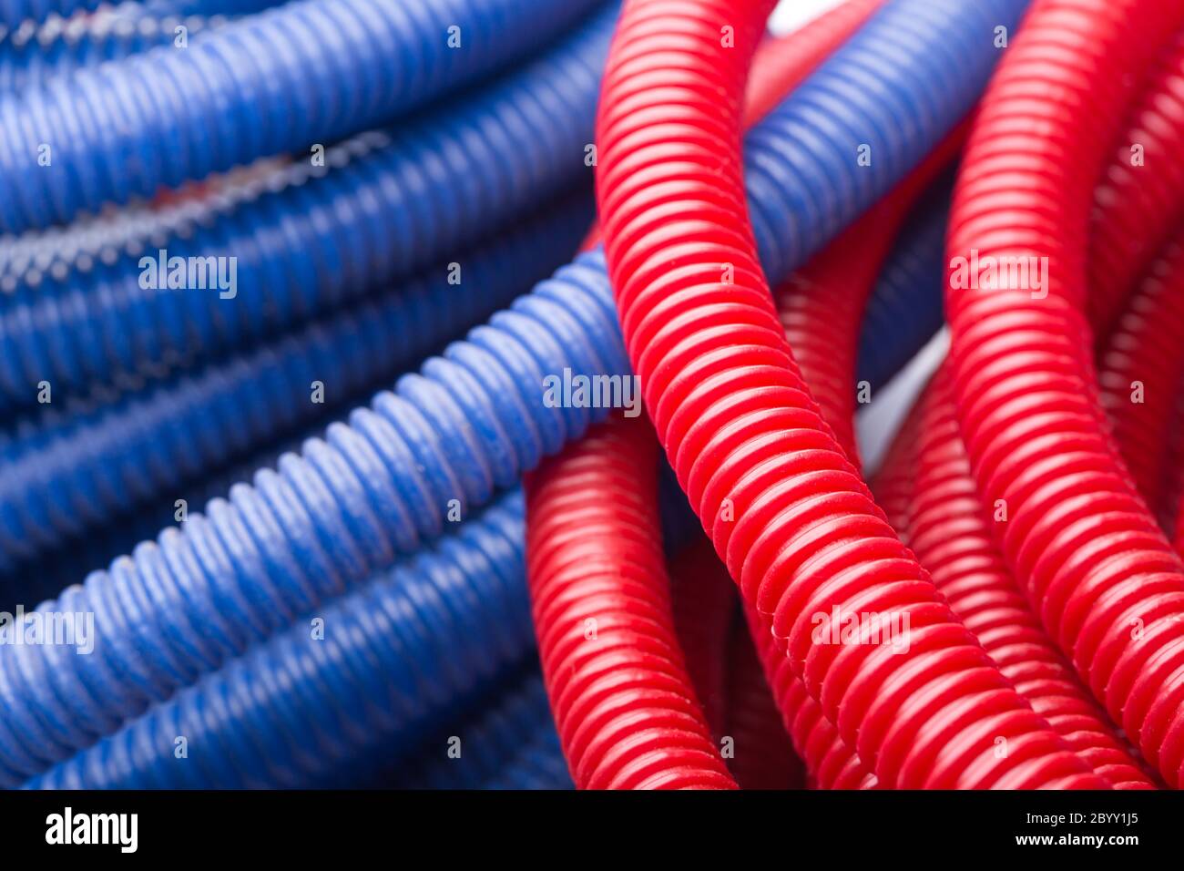 Red and blue water pipes Stock Photo - Alamy