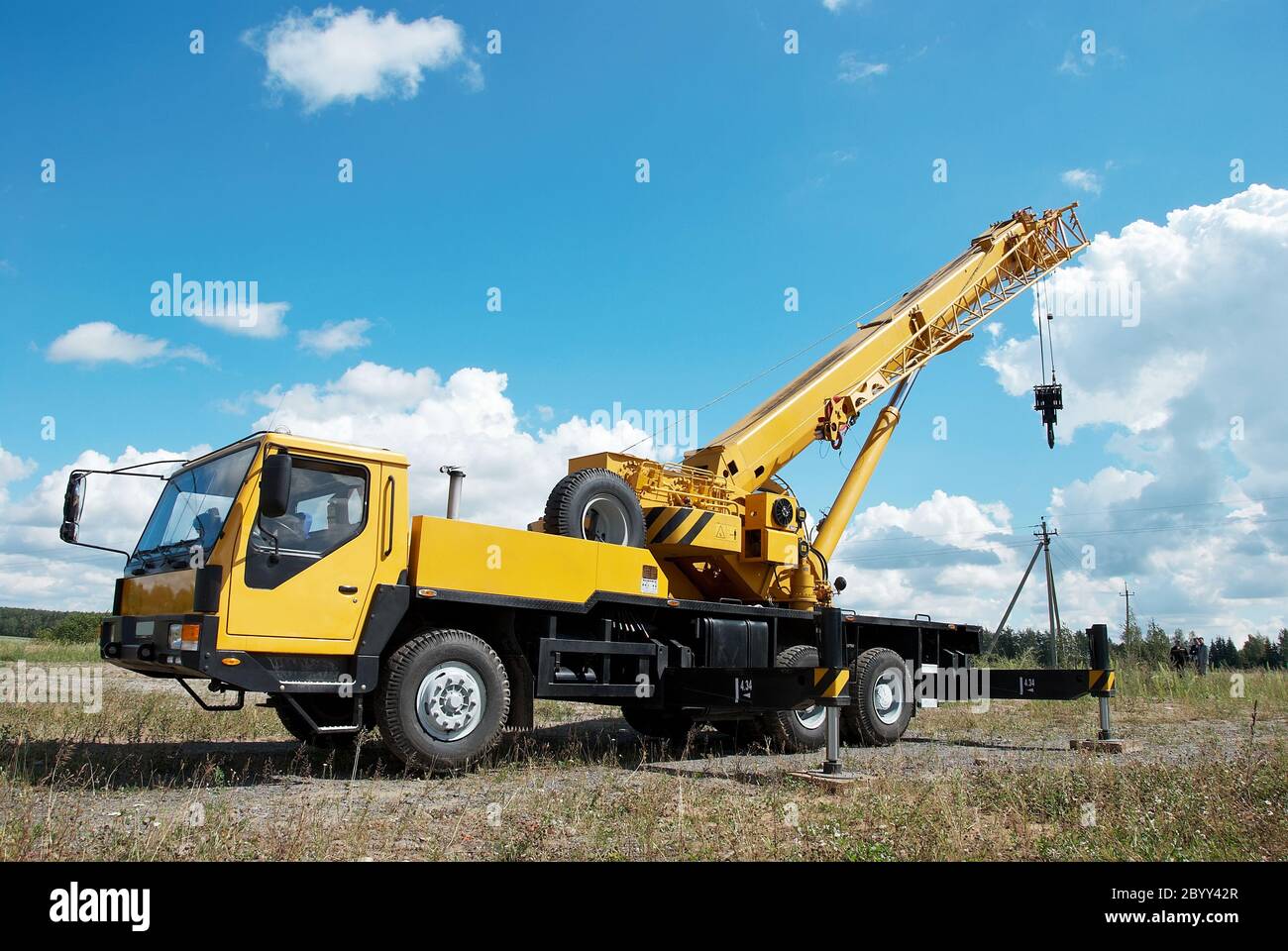 mobile crane with risen boom outdoors Stock Photo - Alamy