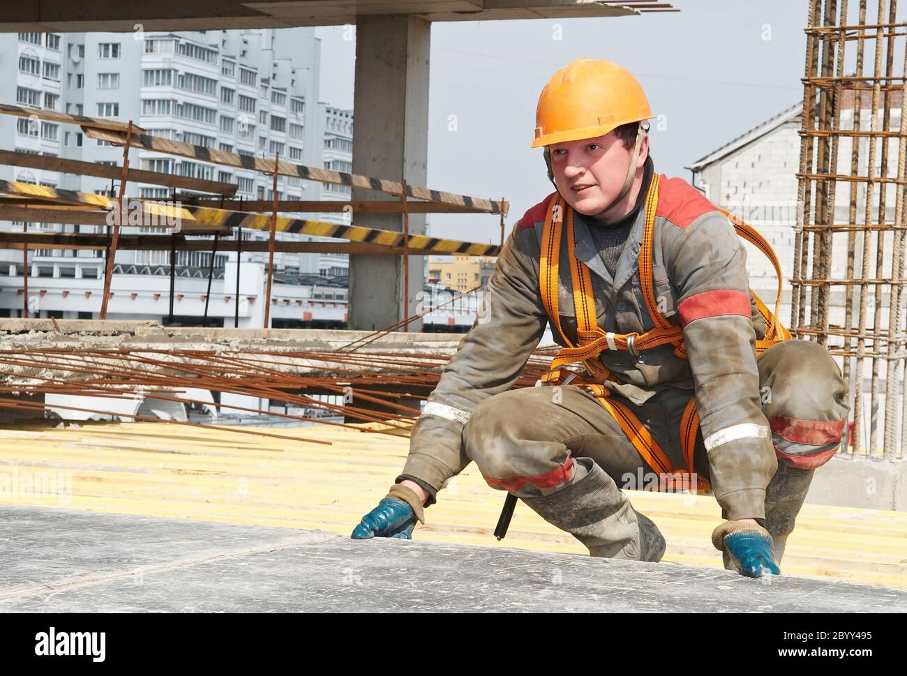 builder worker at construction site Stock Photo - Alamy