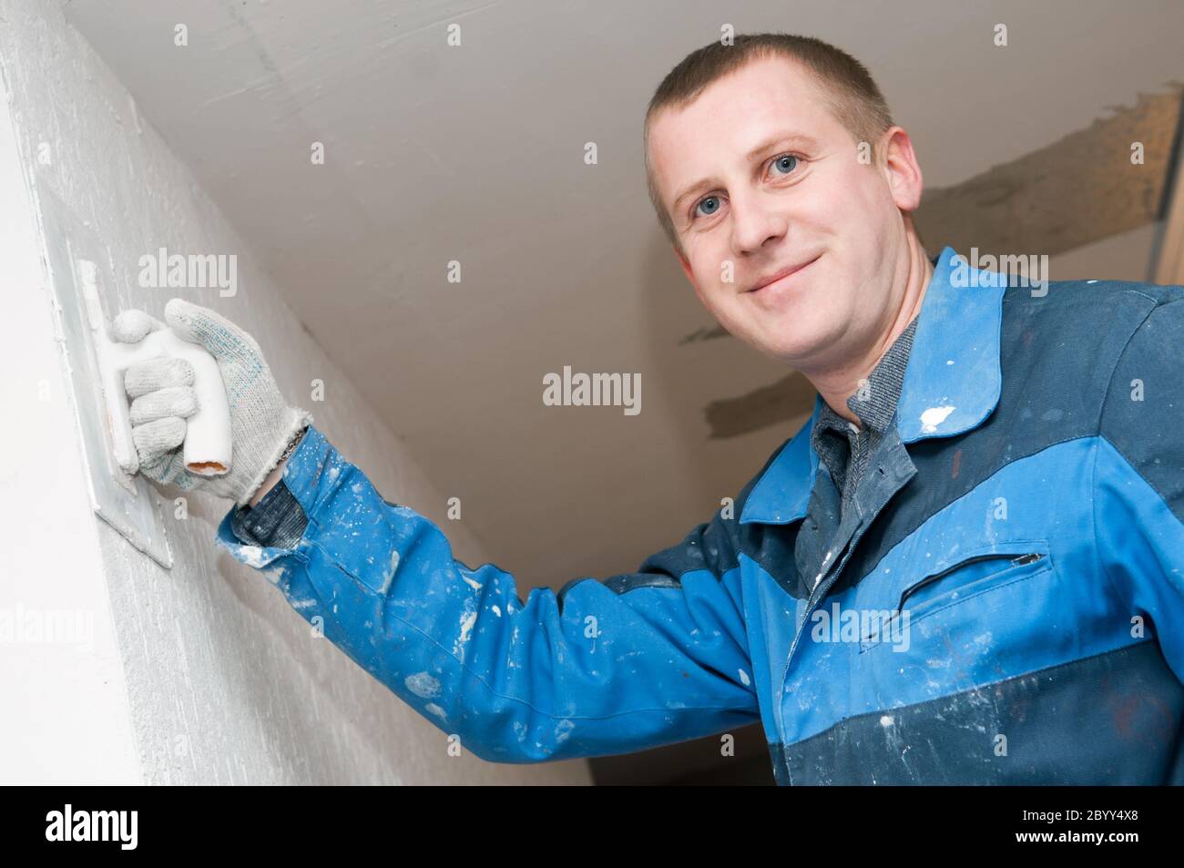 Plasterer at work Stock Photo - Alamy