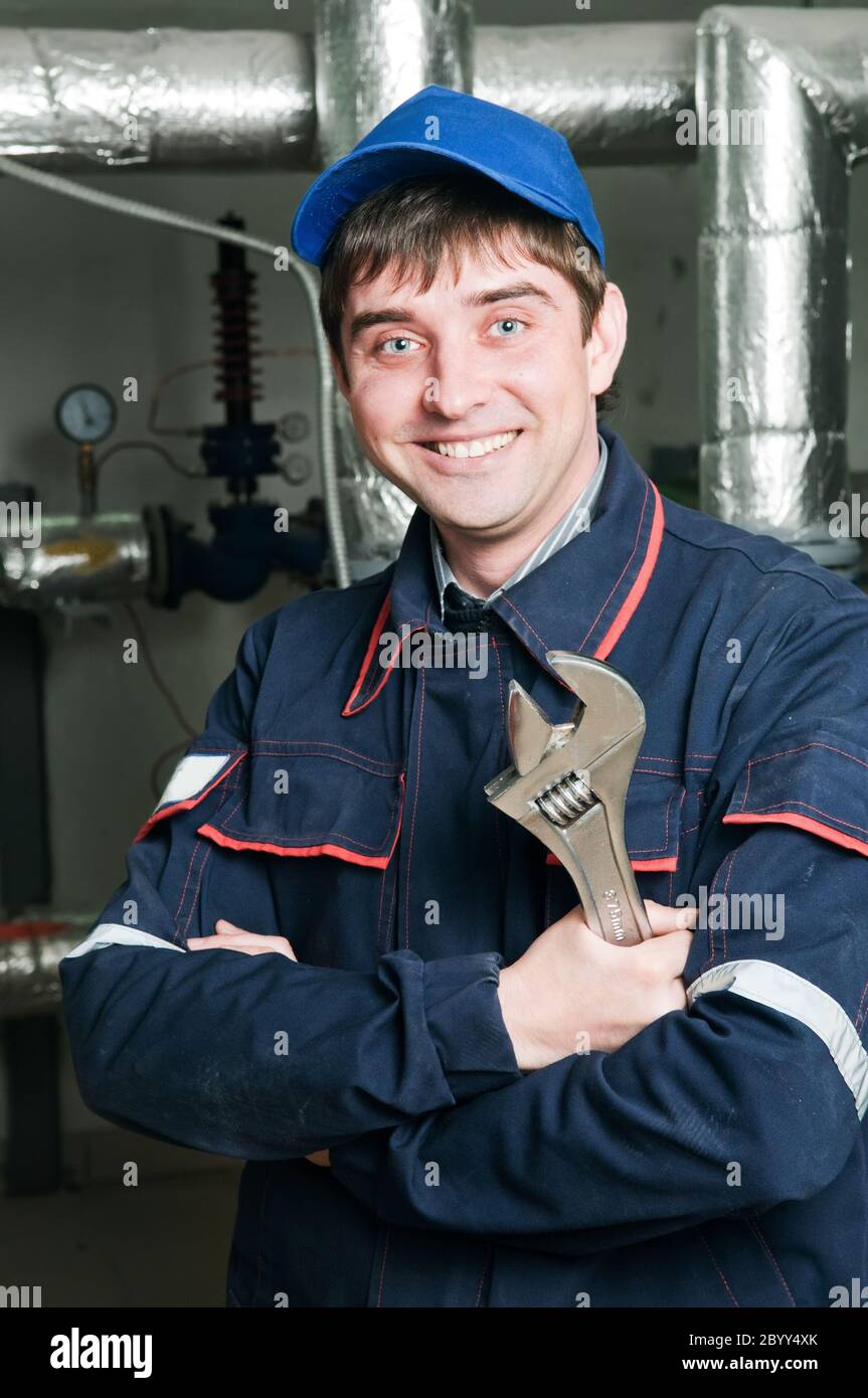 heating engineer in boiler room Stock Photo - Alamy