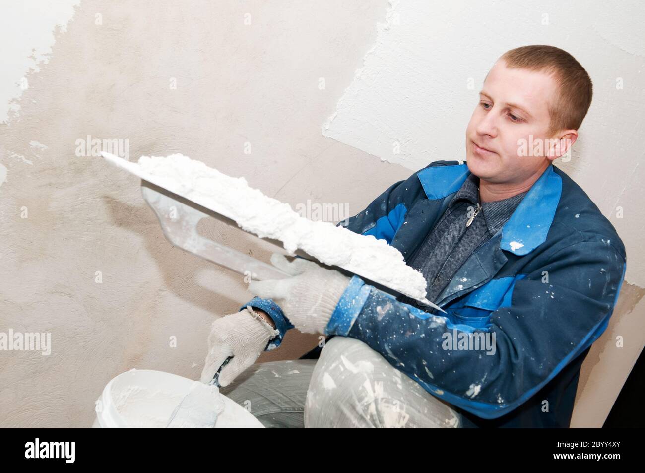 Plasterer at work Stock Photo - Alamy