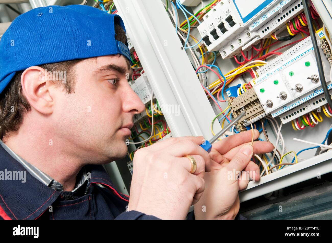 Electrician at work Stock Photo - Alamy