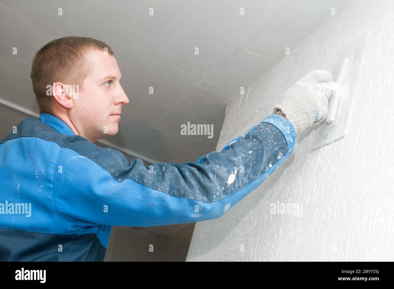 Plasterer at work Stock Photo - Alamy