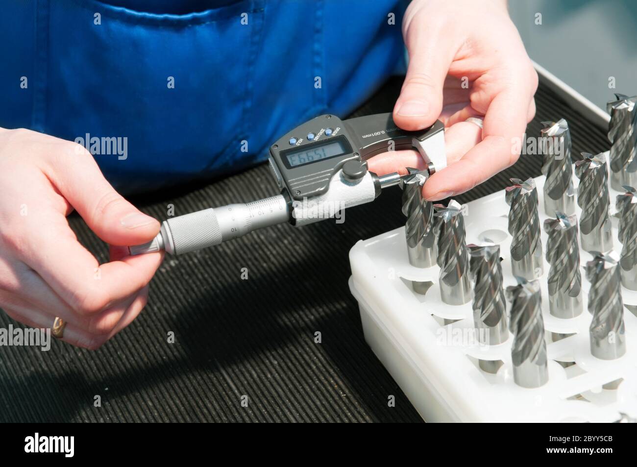 Measuring with micrometer gauge Stock Photo - Alamy