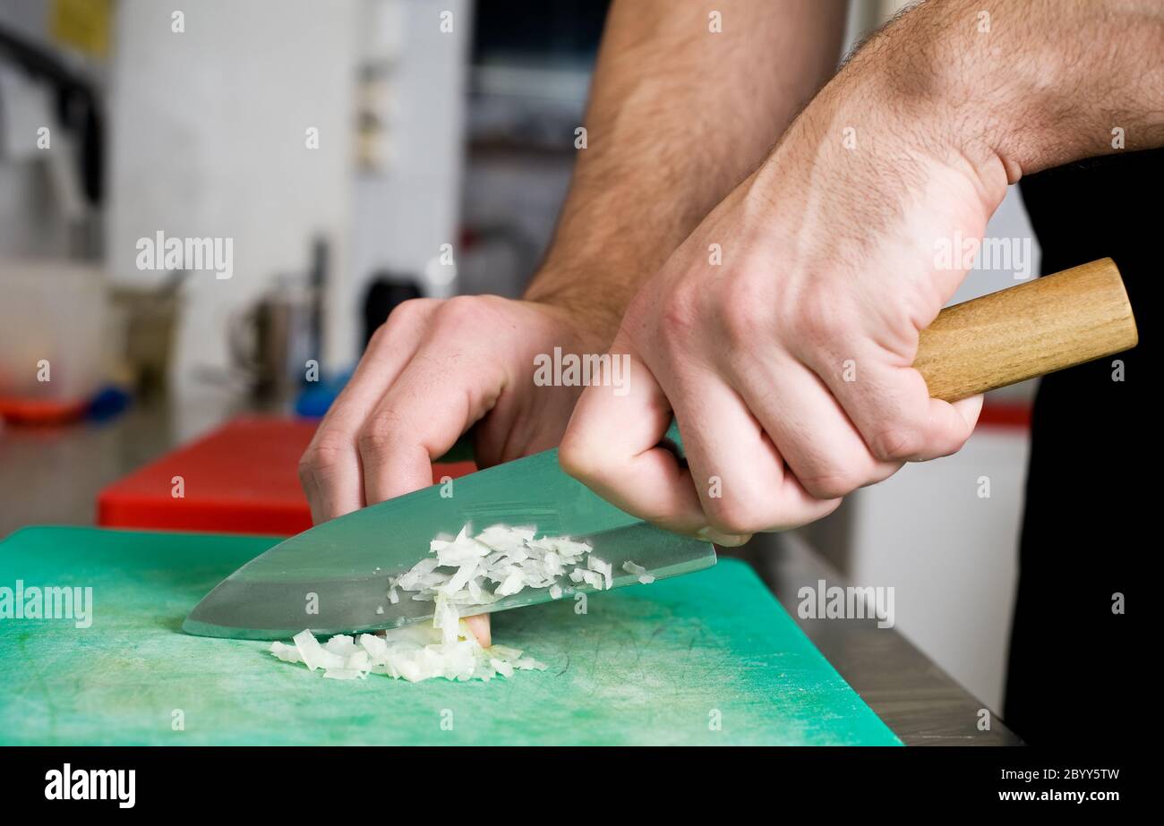cutting greens on board Stock Photo - Alamy