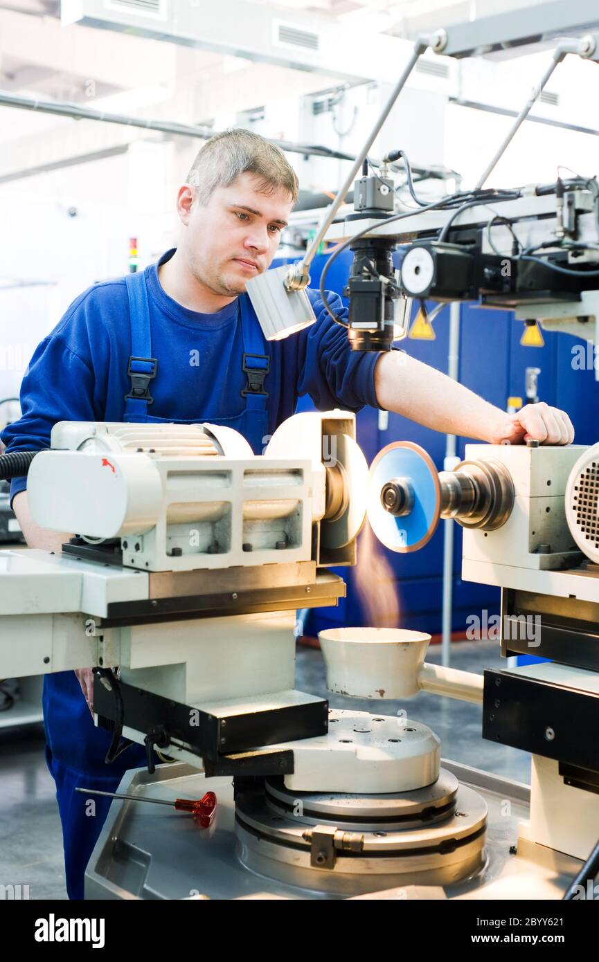 worker at machine tool operating Stock Photo - Alamy