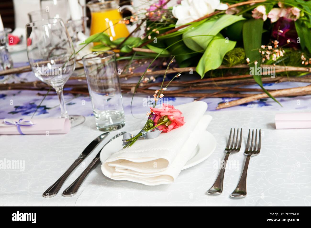 catering table set with flowers Stock Photo - Alamy