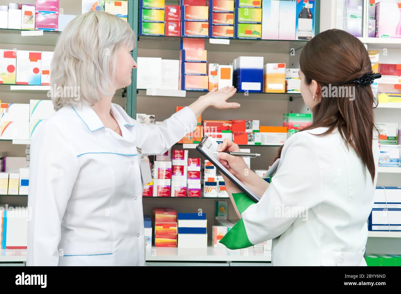 Two women pharmacy hi-res stock photography and images - Alamy