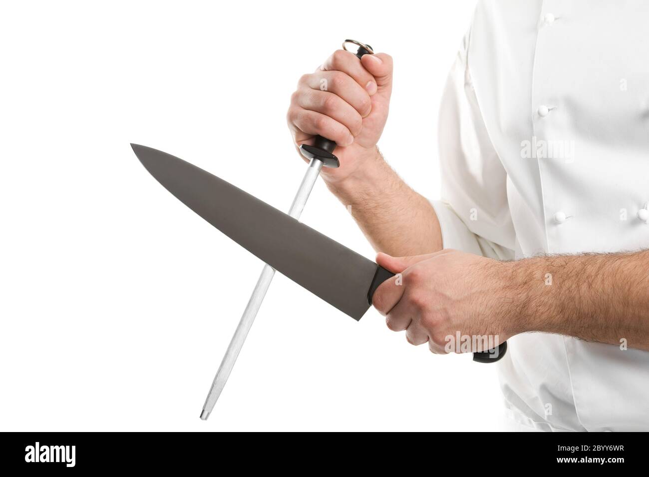 chef hands with knife sharpen steel tool isolated Stock Photo - Alamy