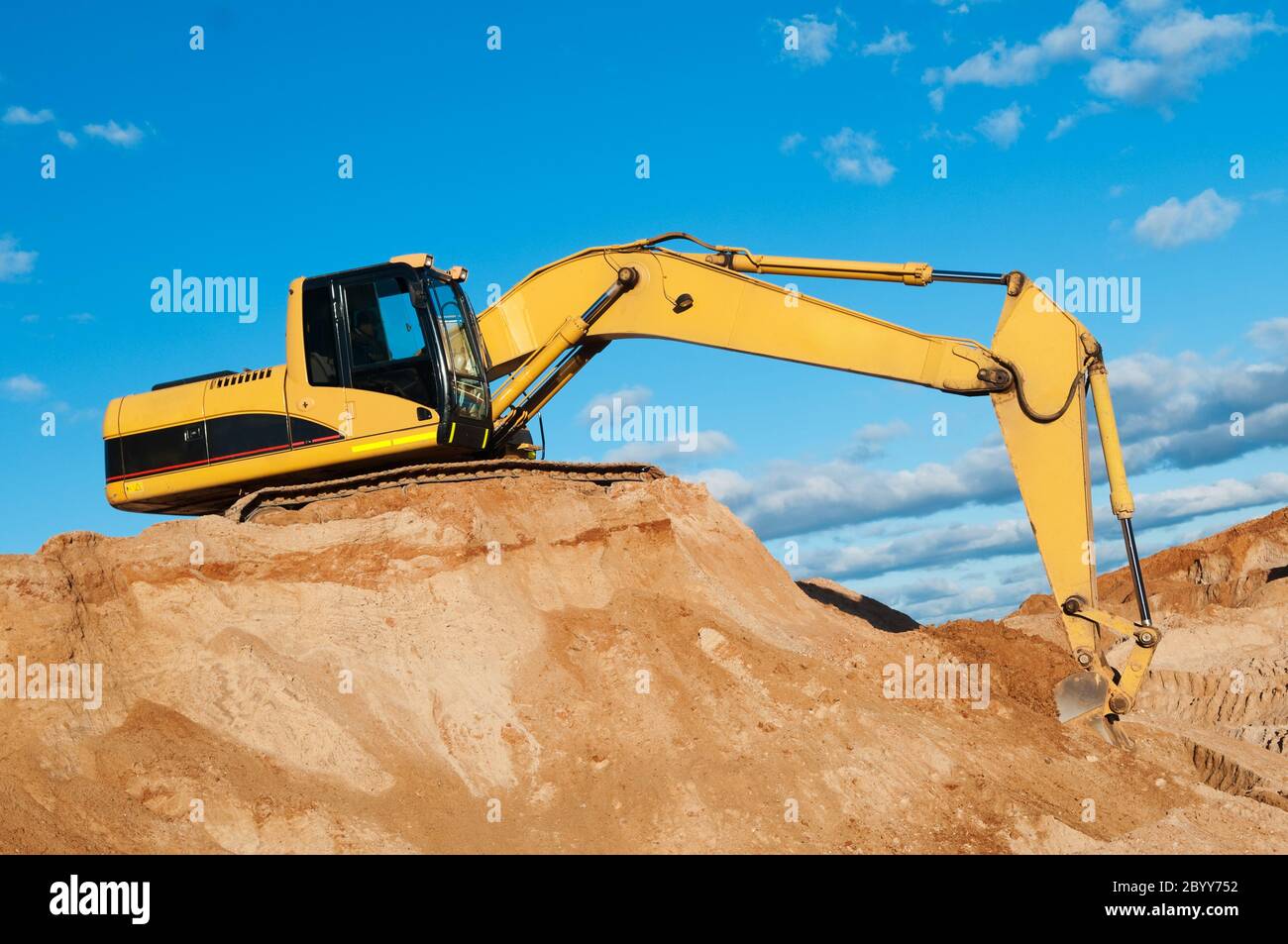 track-type loader excavator at sand quarry Stock Photo - Alamy