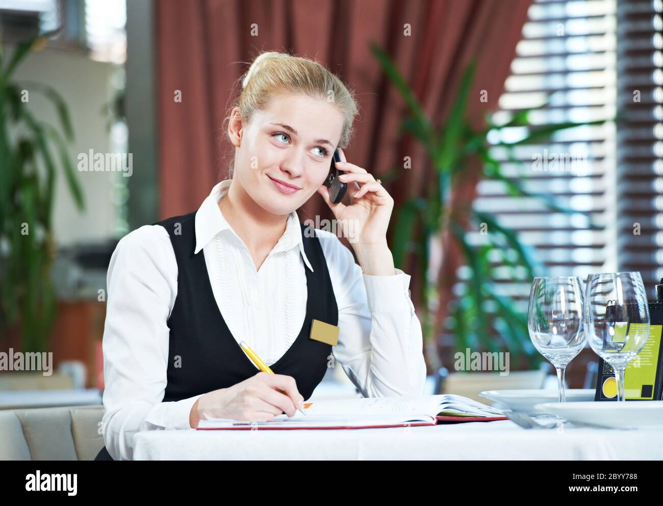 restaurant manager woman at work place Stock Photo - Alamy