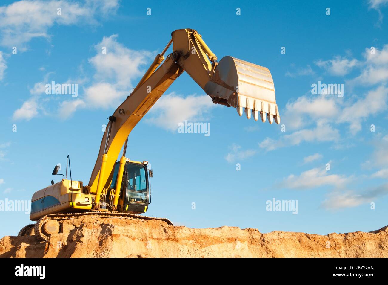 track-type loader excavator at construction area Stock Photo - Alamy