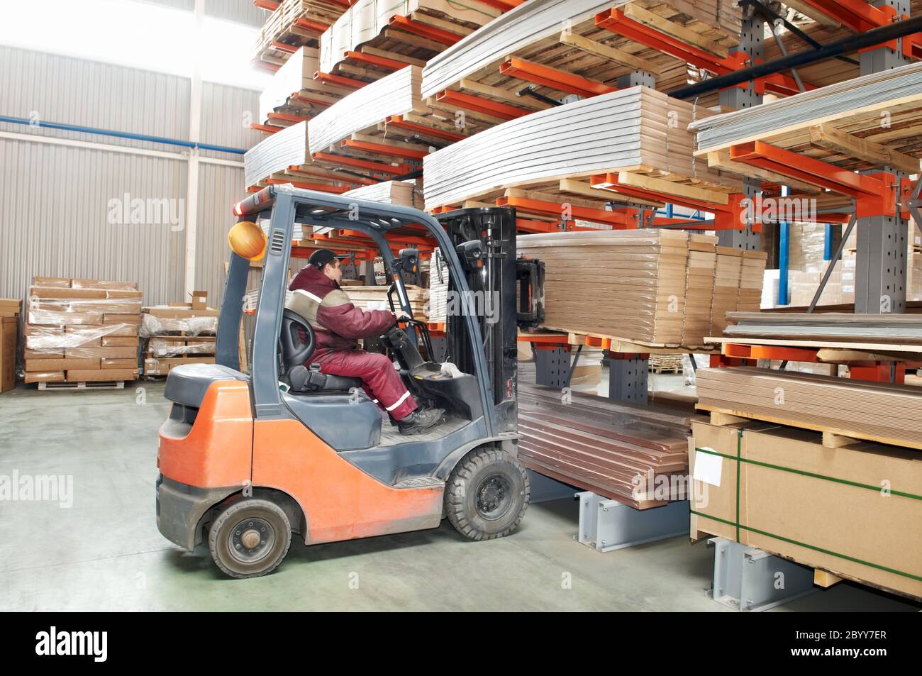 warehouse forklift loader worker Stock Photo - Alamy