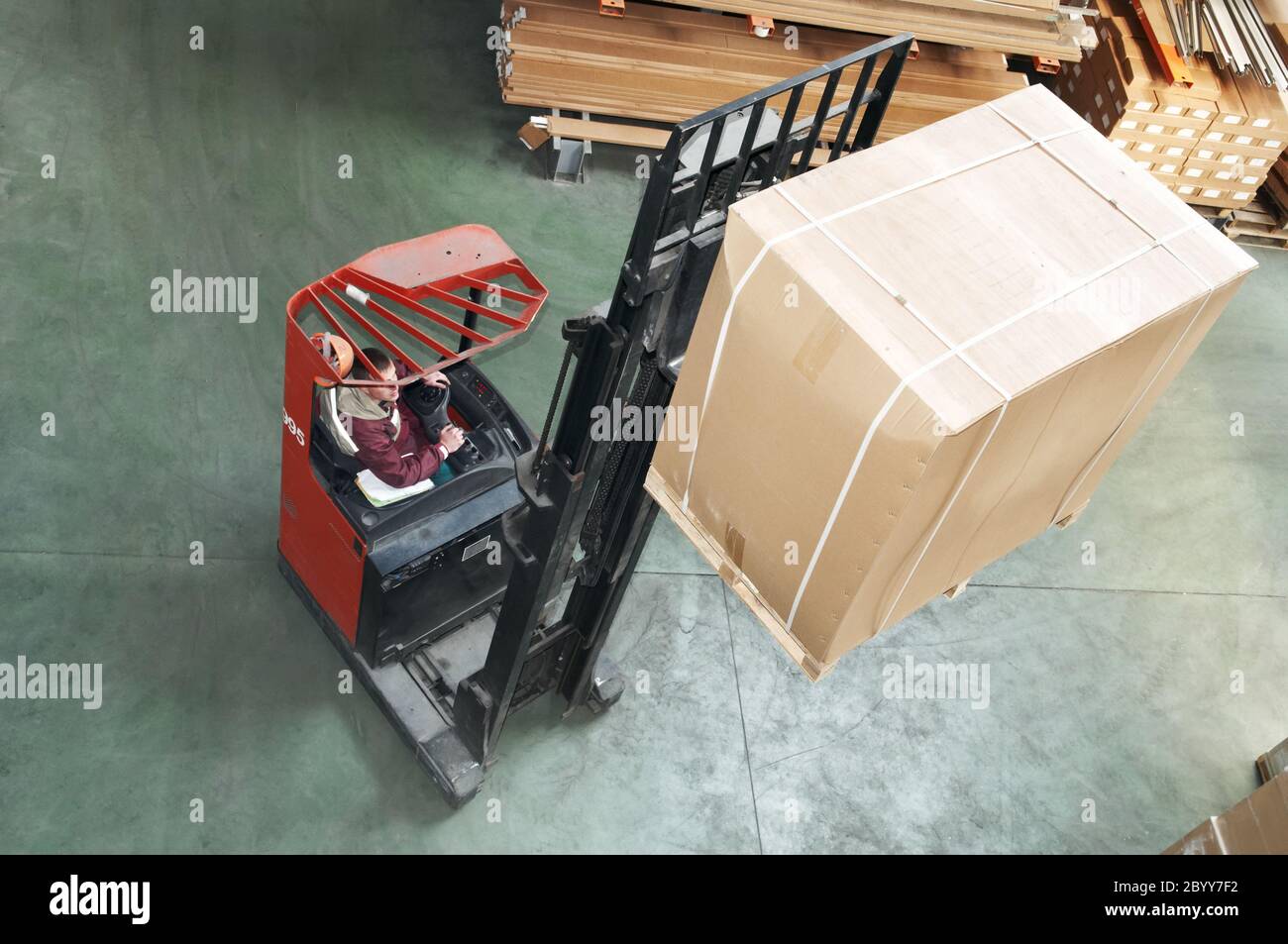 warehouse stacker at work Stock Photo - Alamy