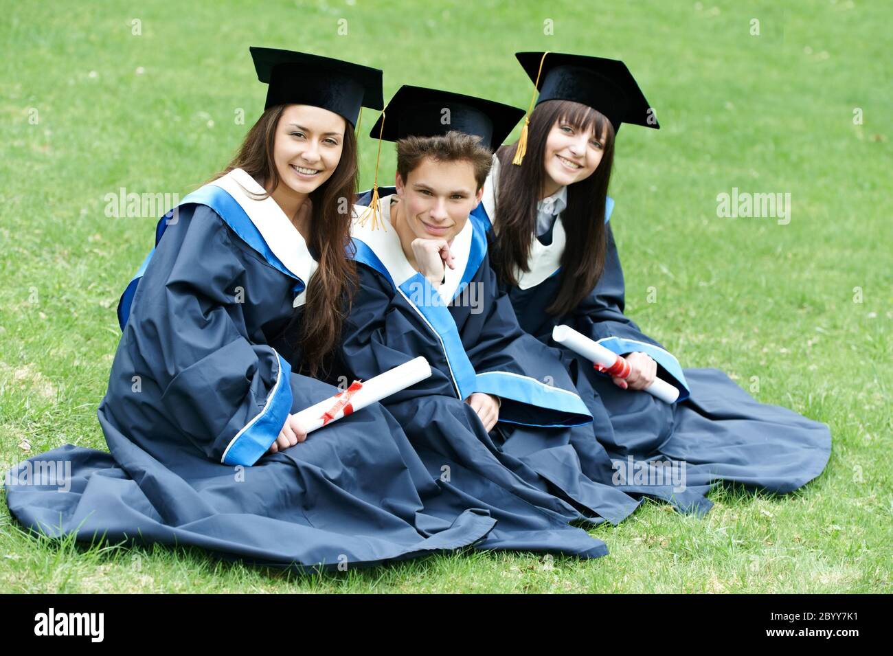 happy graduation students Stock Photo - Alamy
