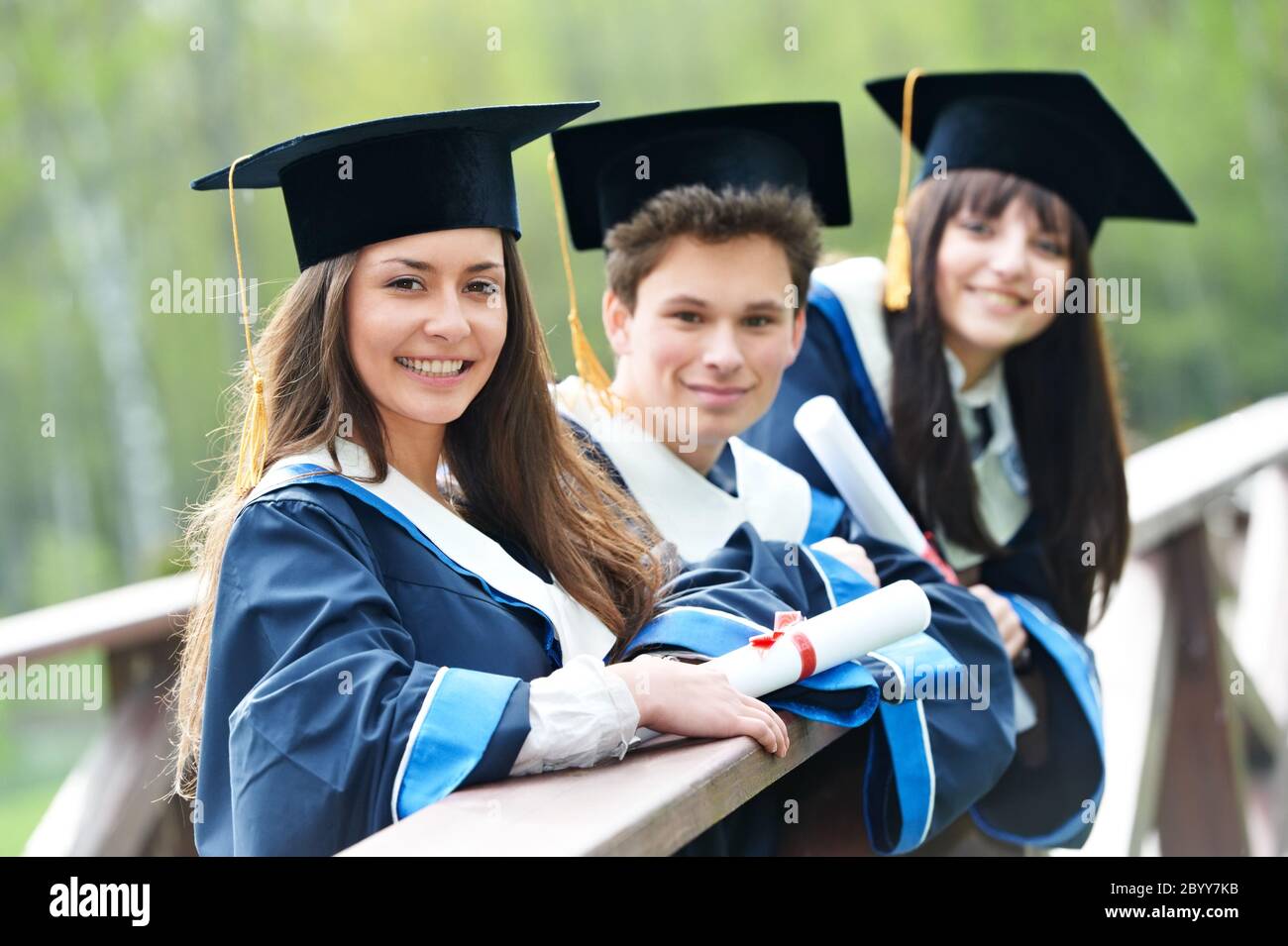 happy graduation students Stock Photo - Alamy