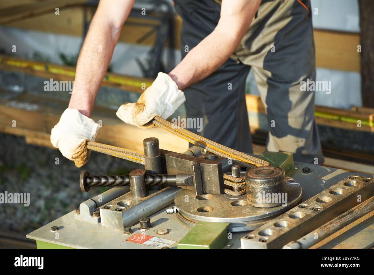 Bending reinforcement metal rebar rods Stock Photo - Alamy
