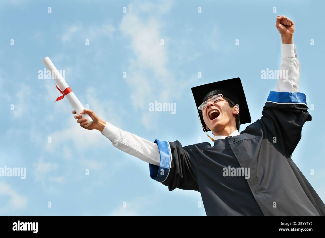 excited graduate studen Stock Photo - Alamy