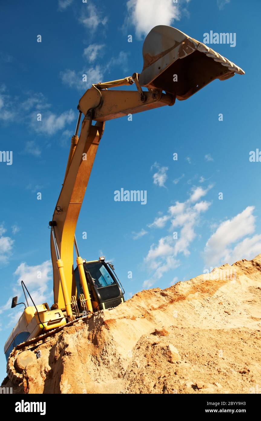 track-type loader excavator at construction area Stock Photo - Alamy