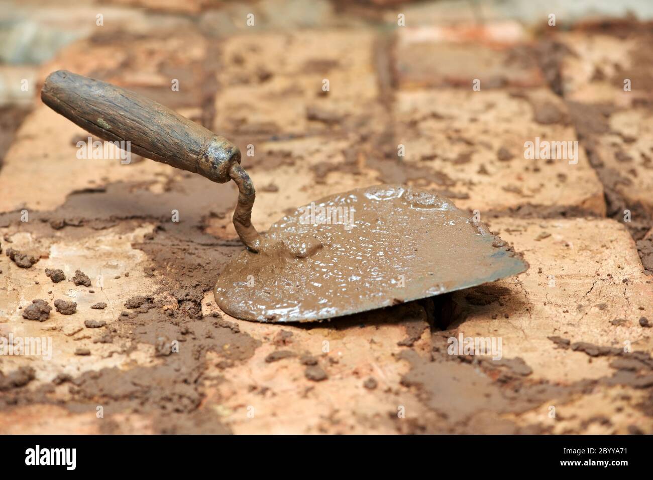 Mason bricklaying background Stock Photo - Alamy