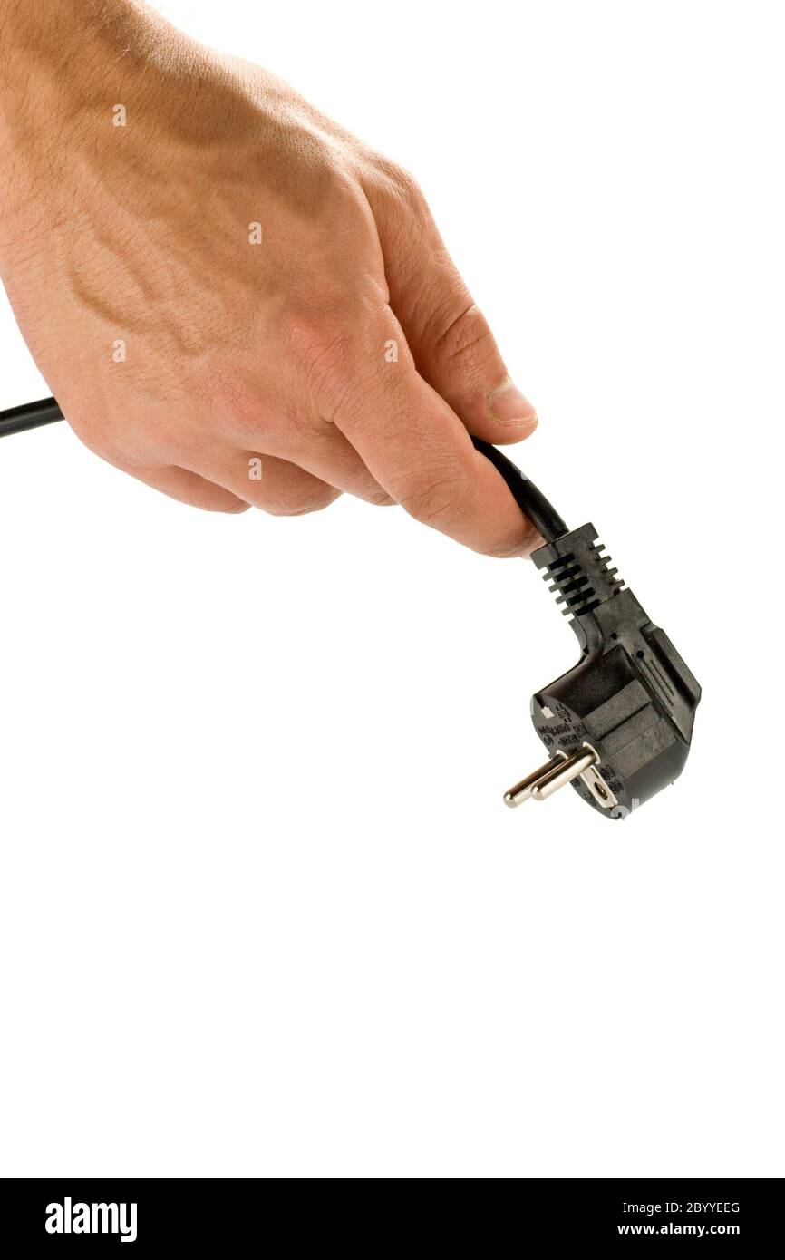 Hand with plug Stock Photo - Alamy