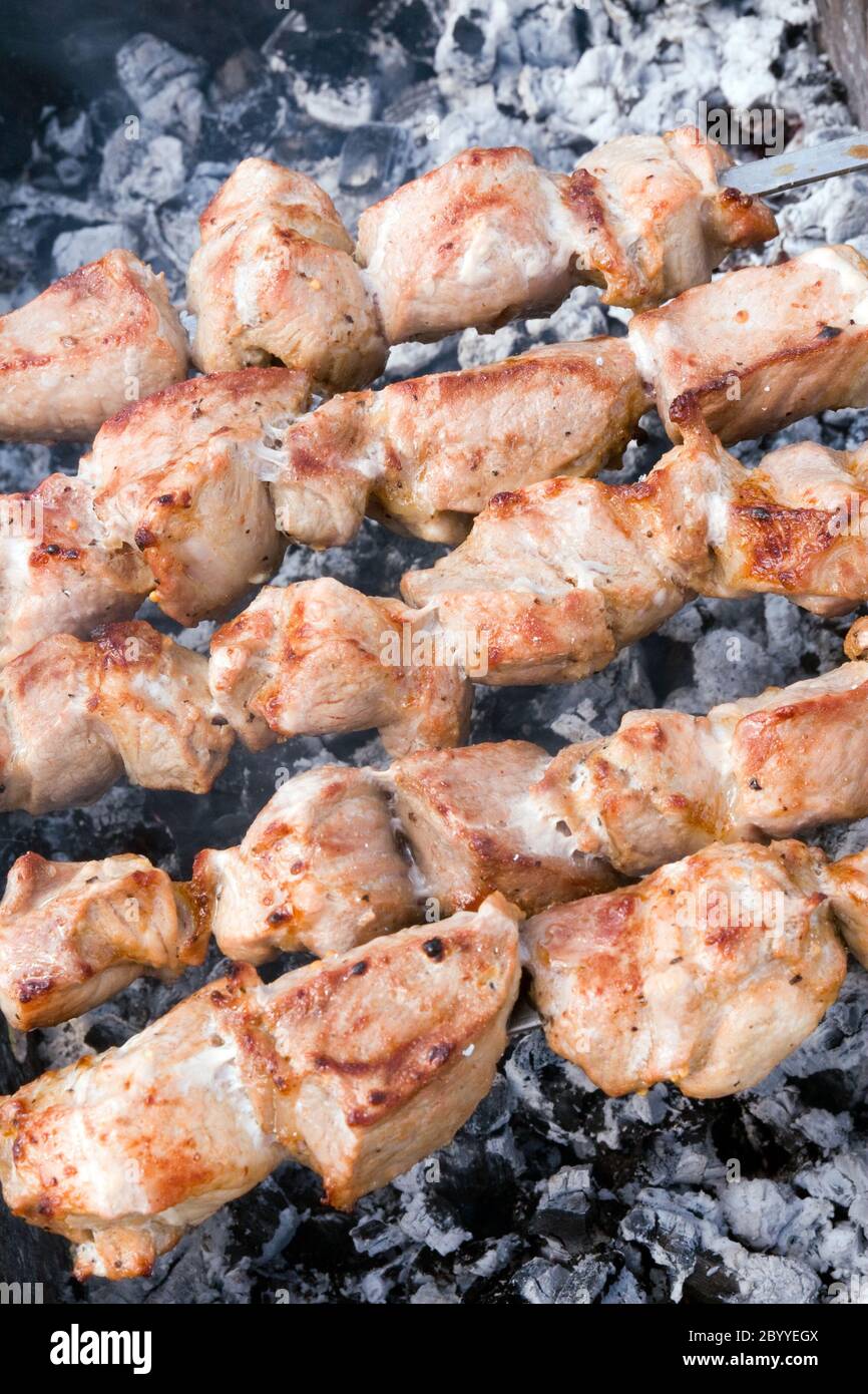 meat cooking on a skewer Stock Photo - Alamy