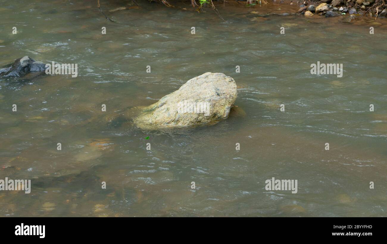 Rocks in the river after the flood. Images suitable for use as ...