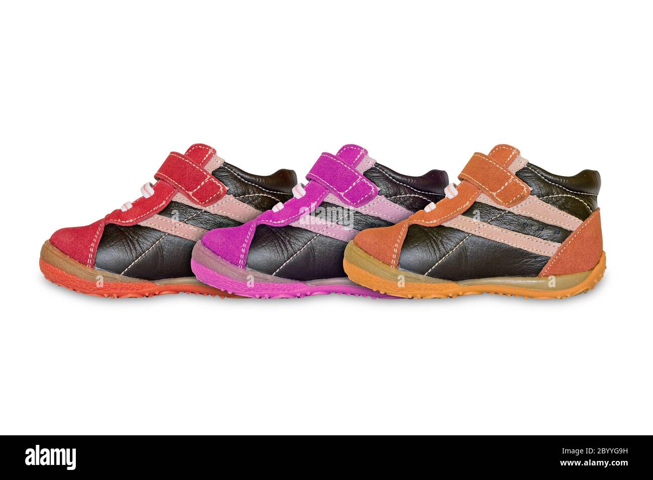 three baby shoes Stock Photo - Alamy