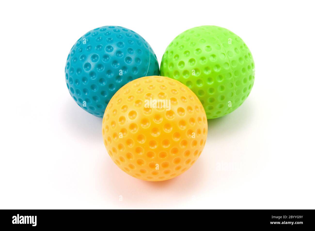 three colored plastic balls Stock Photo - Alamy