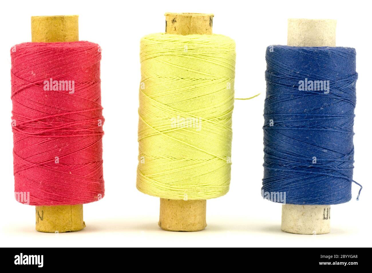 three thread spools Stock Photo - Alamy