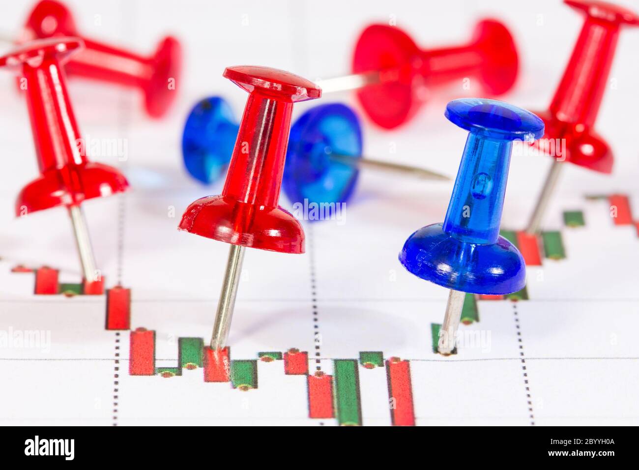 Graph with red and blue push-pins Stock Photo - Alamy