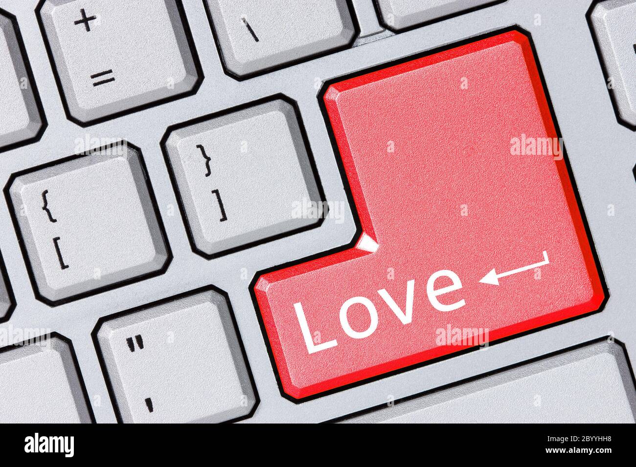 Modern keyboard with love text Stock Photo - Alamy