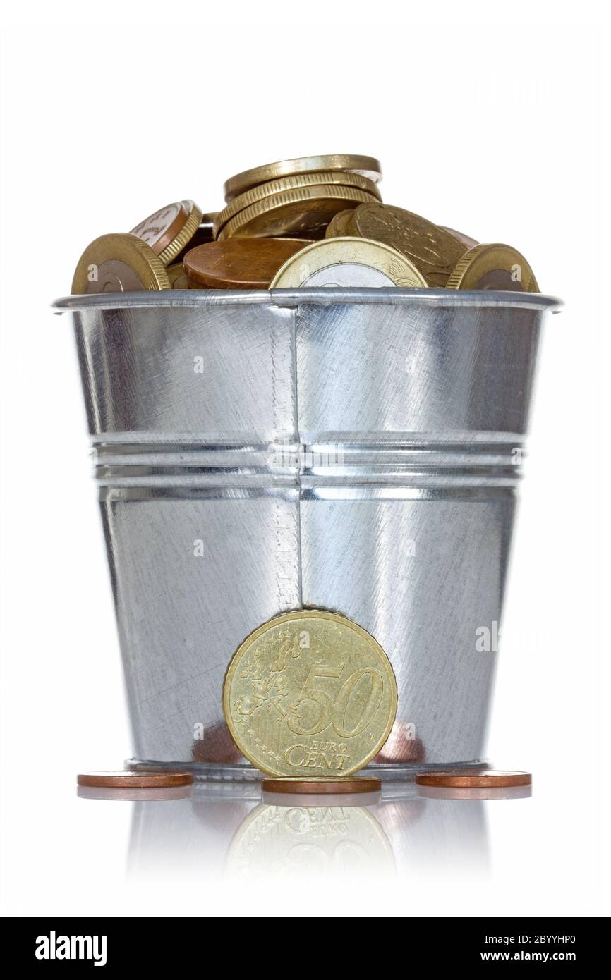 Full bucket of coins Stock Photo - Alamy