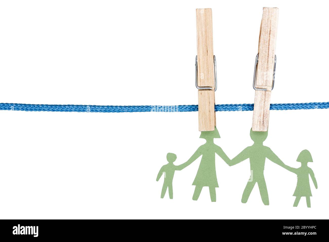 Paper family on the clothesline Stock Photo - Alamy