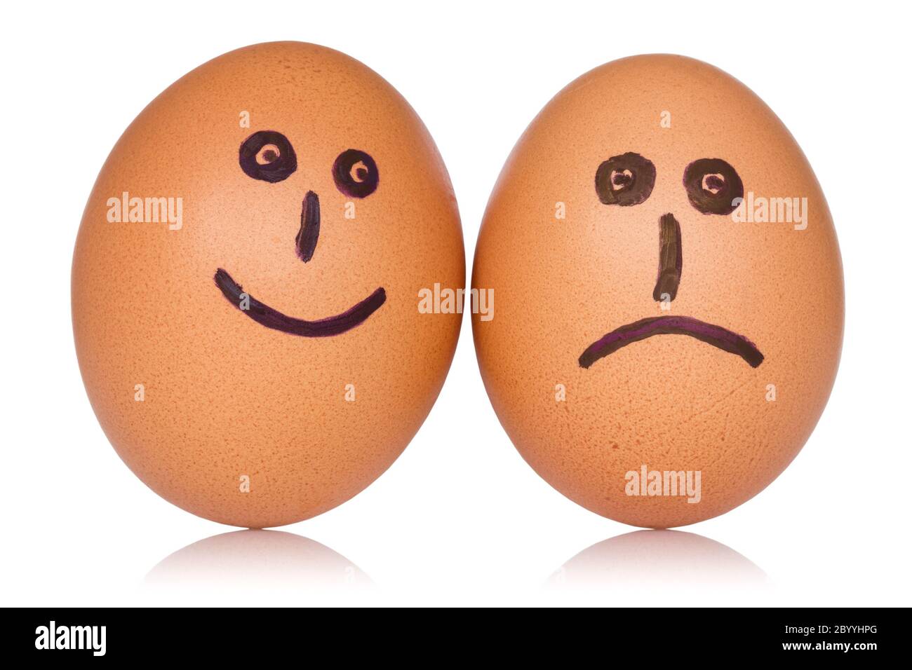 Happy and angry eggs Stock Photo - Alamy