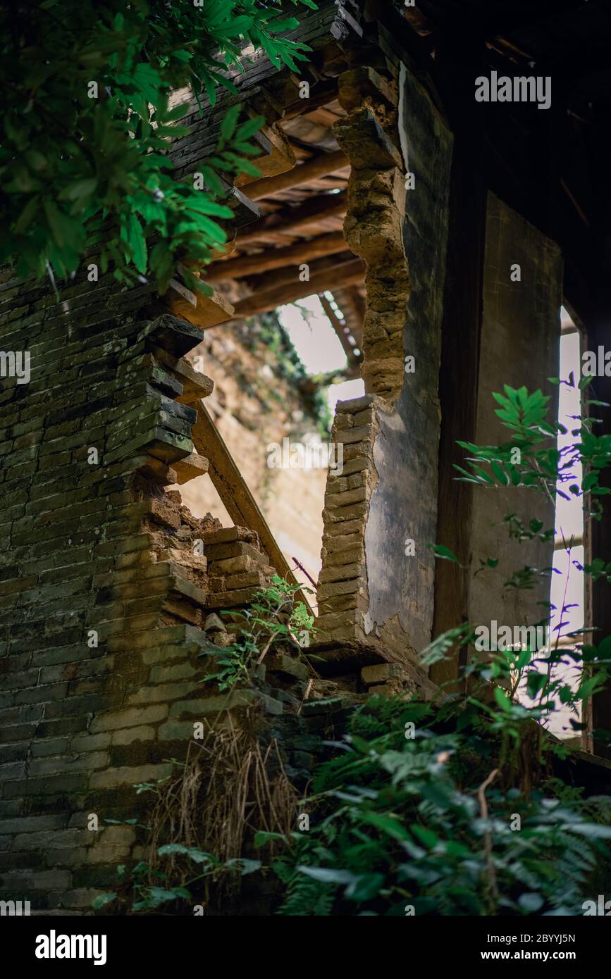 Corner of dilapidated house in traditional Chinese ancient village ...