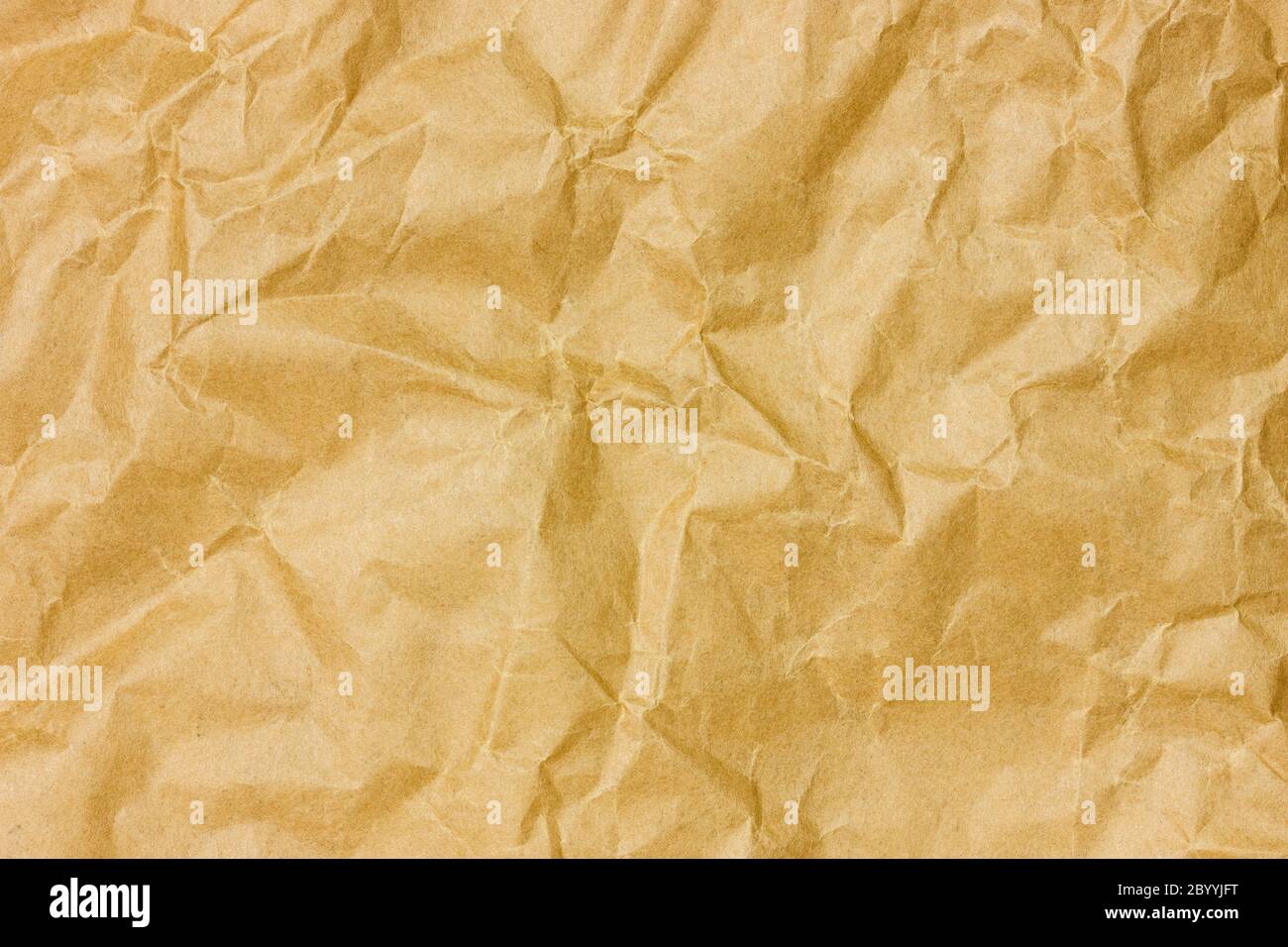Brown crumpled paper sheet Stock Photo - Alamy
