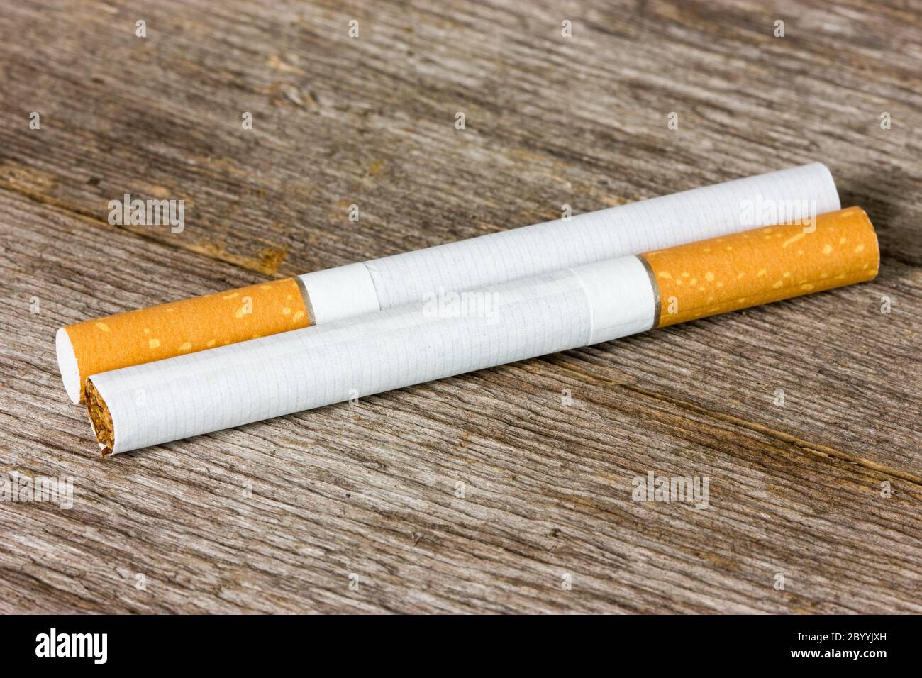 Cigarettes tobacco on wooden hi-res stock photography and images - Alamy