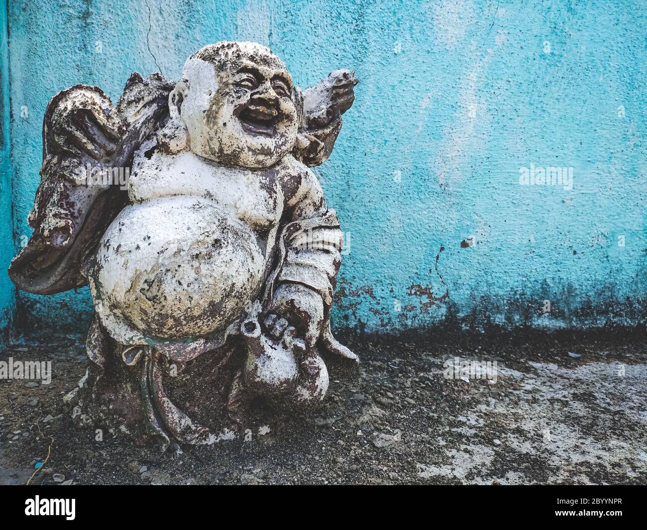 Laughing Buddha Statue - old destroyed statue of Laughing Buddha ...