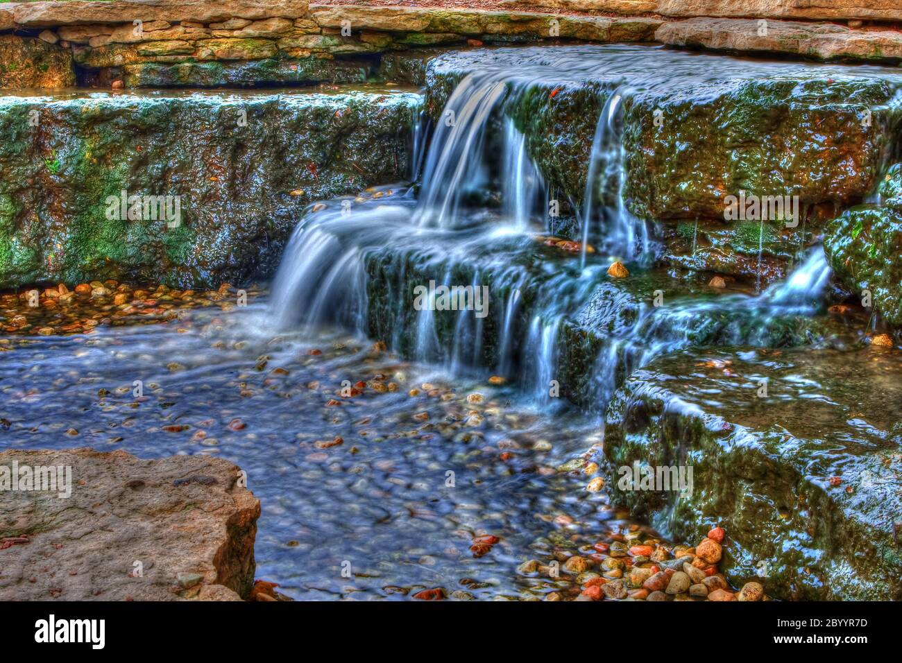 Beautiful cascading waterfall in High Dynamic Range Stock Photo - Alamy
