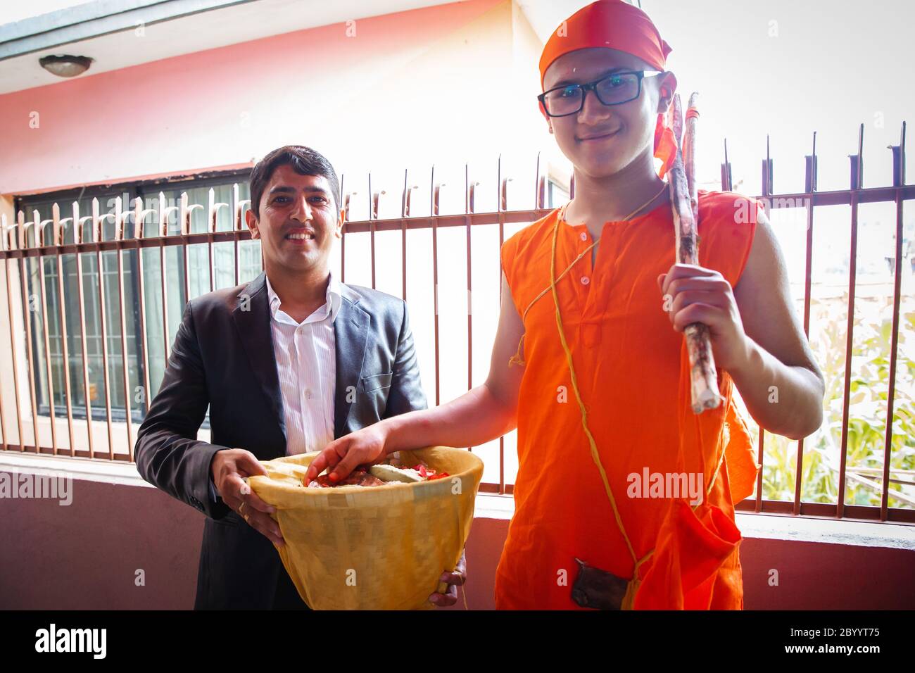 Kathmandu,Nepal - June 11,2019: Hindu Holy boy with his maternal uncle ...