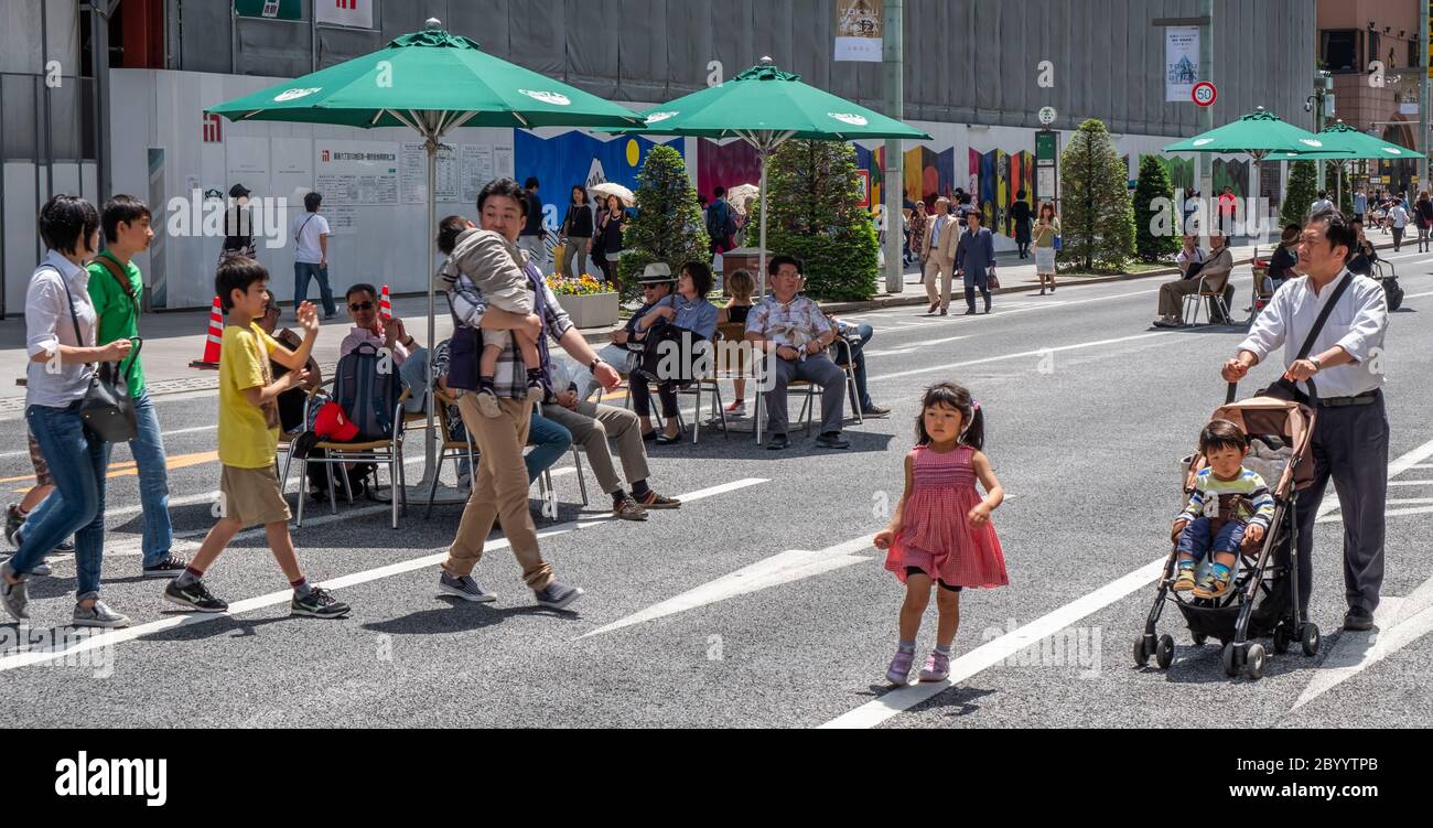People at the famous Ginza street during a summer afternoon, Tokyo ...