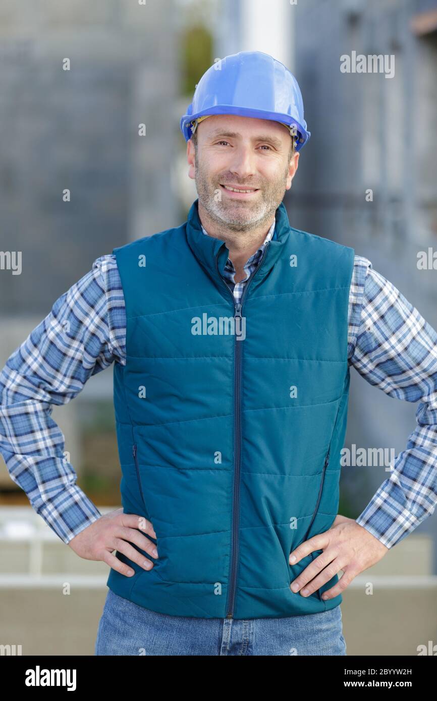 Professional builder in blue overall hi-res stock photography and ...