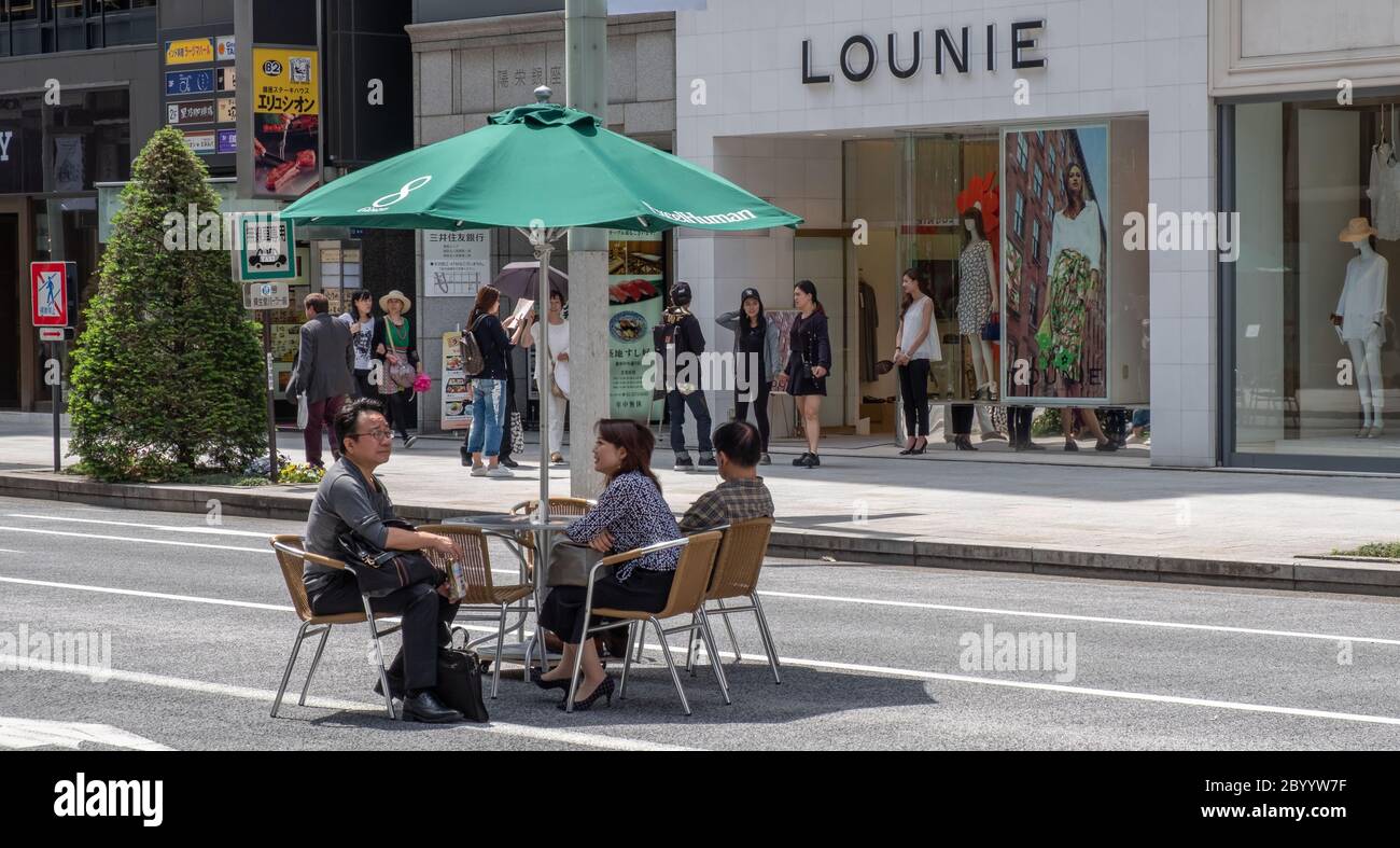 People at the famous Ginza street during a summer afternoon, Tokyo ...