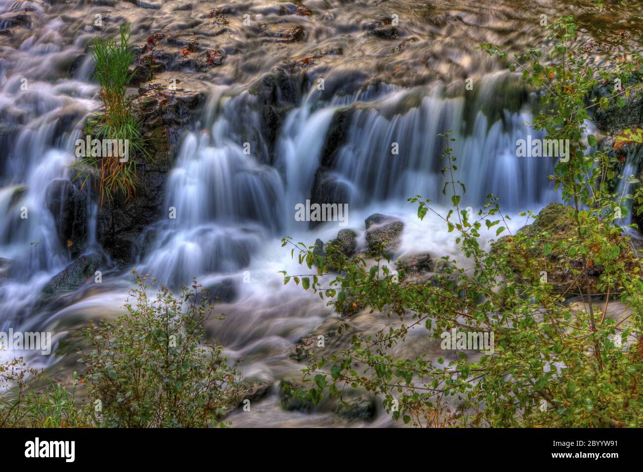 Colorful scenic waterfall in HDR Stock Photo - Alamy
