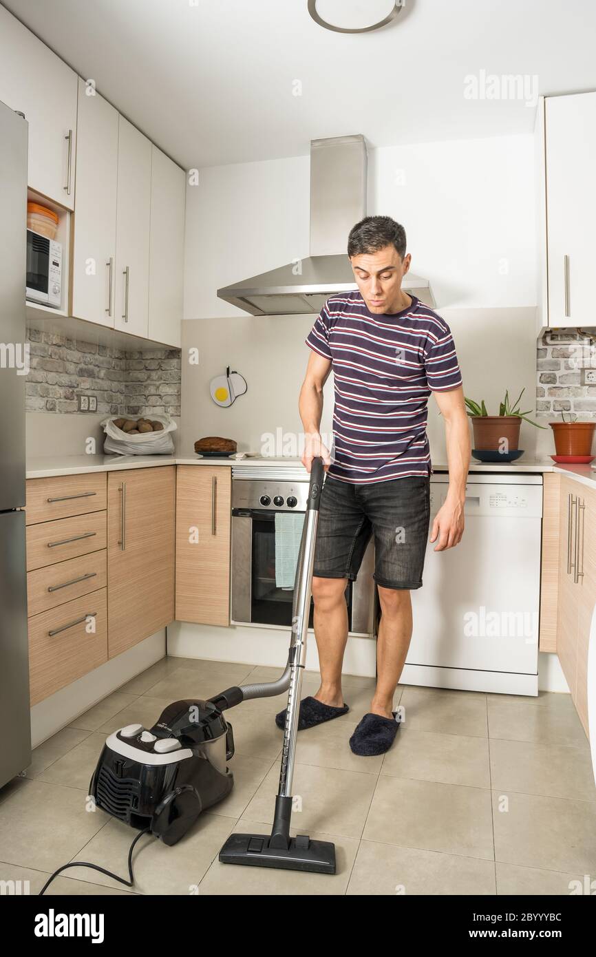 Man Vacuuming High Resolution Stock Photography and Images - Alamy
